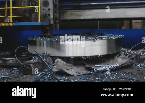 Milling machine cutting the sample part. Turning lathe in action.Facing ...