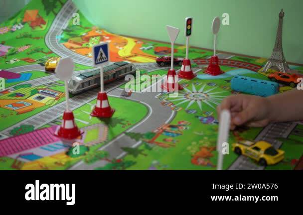 Kiev, Ukraine, Europe - August 2019: A boy plays with toy cars ...