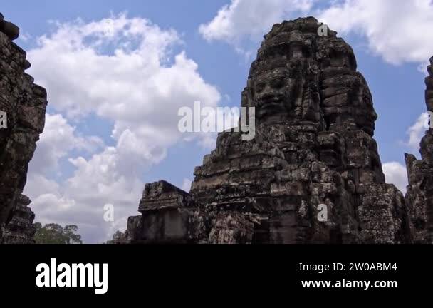 4K, Face towers depicting Bodhisattva Avalokiteshvara. Smiling faces ...