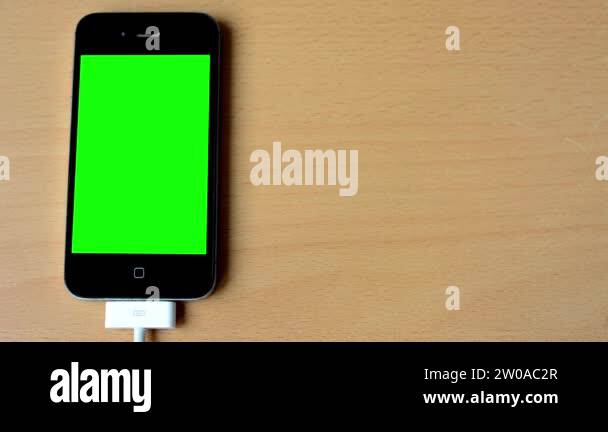 Smartphone - green screen - connect cable - table Stock Video Footage ...
