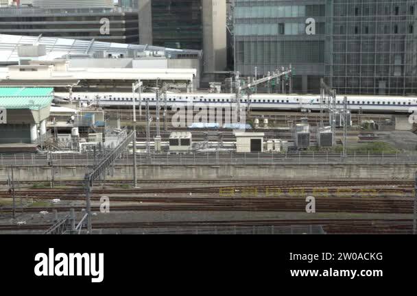 4K Elevated view of Trains high-speed rail at Tokyo Station in exterior ...