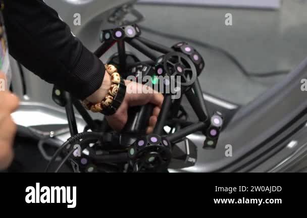 , Taiwan-26 April, 2019: Man hand scanning a motorcycle using a ...