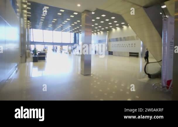 People walk in exhibition center Stock Video Footage - Alamy