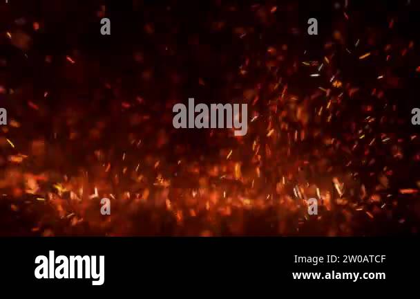Burning red hot sparks fly from large fire in the night sky. Beautiful ...
