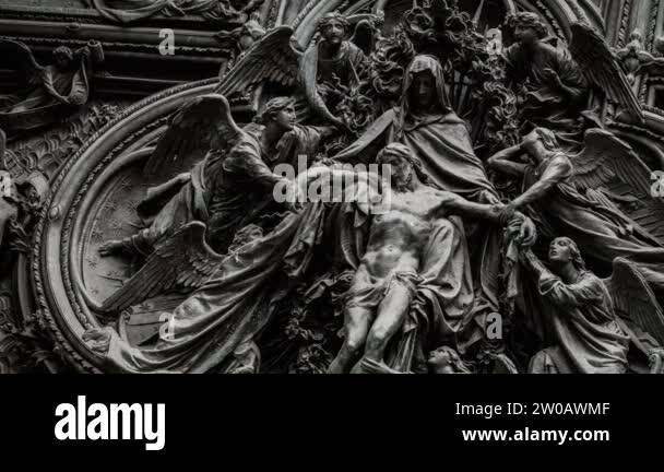 Beautiful Duomo di Milano iron gates decor in close up.Jesus Christ ...