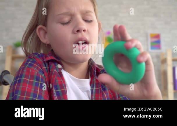 teenage girl undergoes rehabilitation after hand injury with the help ...