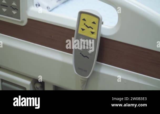 Hospital bed position control panel with buttons weighing on the bed ...