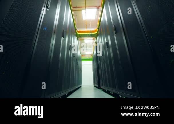 Racks with computers stand in a data center room Stock Video Footage ...