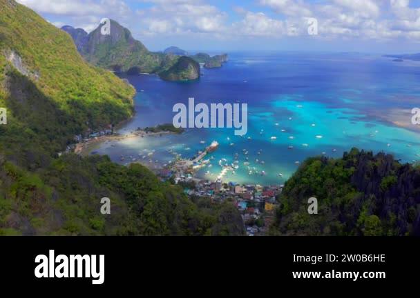 View from the observation deck at Taraw cliff over central El Nido town ...