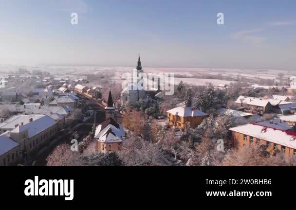 Aerial 4k view of Reformed Calvinist and Orthodox churches in a small ...