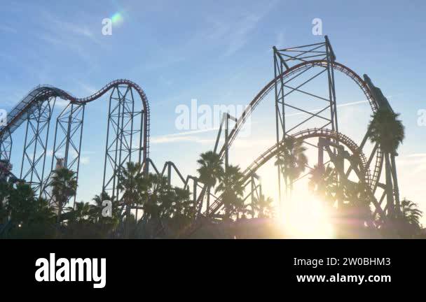 LENS FLARE: Evening sunbeams illuminate the massive frame of roller ...