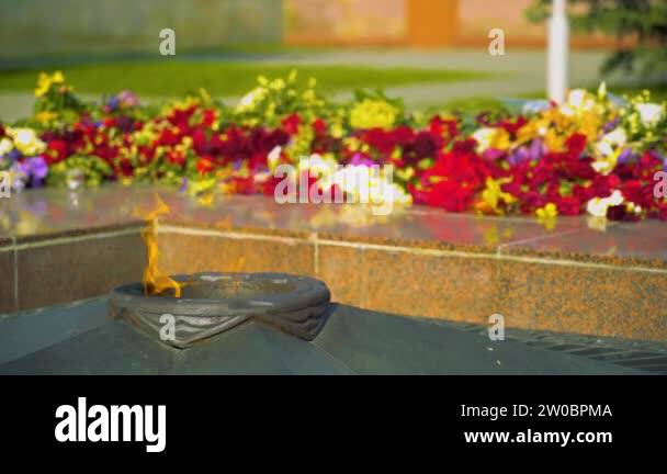 Eternal Flame memorial monument with star at Tomb of Unknown Soldier ...