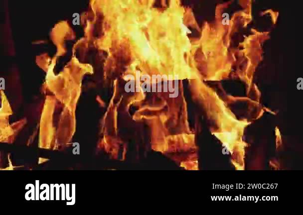 Close-up photo of bright burning fire at the bottom of shot. Flame ...