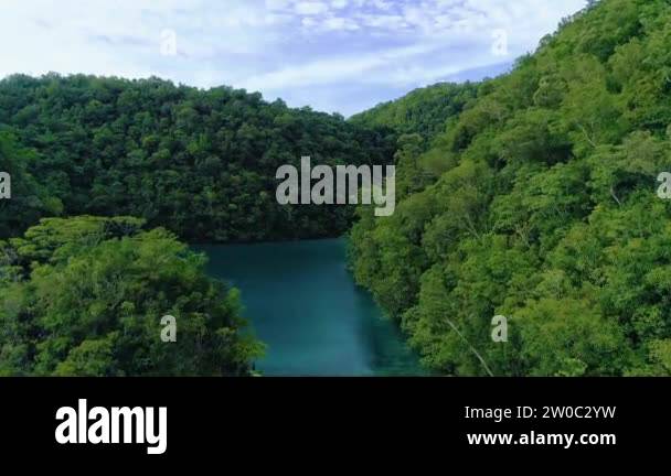 Tropical landscape rainforest hills and azure water in lagoon with ...