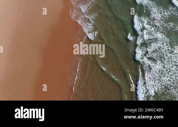 Tropical beach aerial view, Top view of waves break on tropical yellow ...