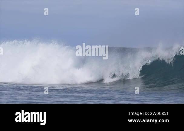 SLOW MOTION: Amazing rolling ocean waves rush from the open seas of the ...