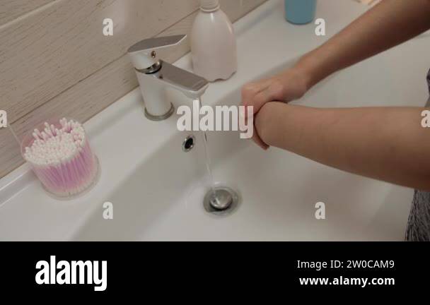 Female hands over the wash basin, hand washing, health concept, hand ...