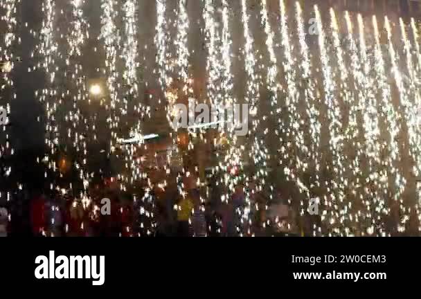 Taipei, Taiwan-30 May, 2017: 4K Bright fire rain falling down in ...