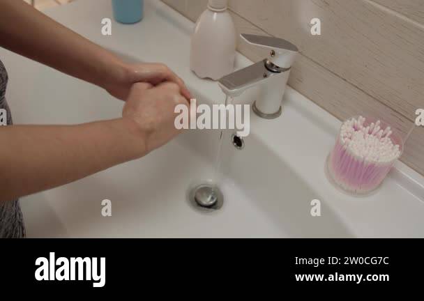 Female hands over the wash basin, hand washing, health concept Stock ...