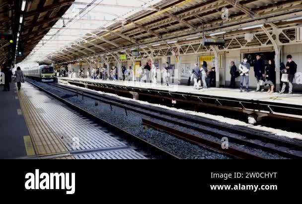 TOKYO, JAPAN - CIRCA MARCH, 2017: Platform with passengers metro ...