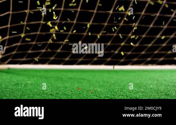 Animation of a close up of a football bouncing on a football pitch in ...