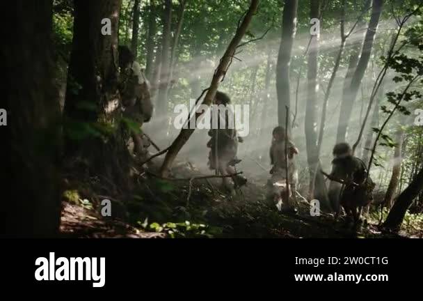Tribe of Hunter-Gatherers Wearing Animal Skin Holding Stone Tipped ...