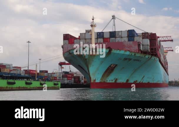 SINGAPORE - MAY 08 2020: Container cargo ship load in the seaport ...