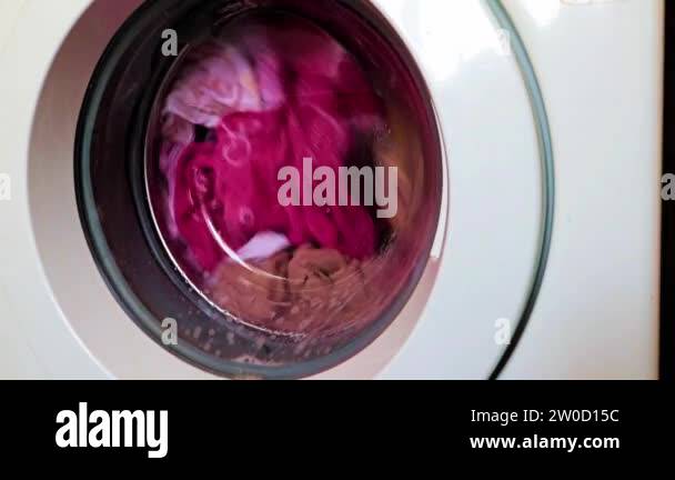 rotation of the washing machine drum while washing clothes Stock Video ...