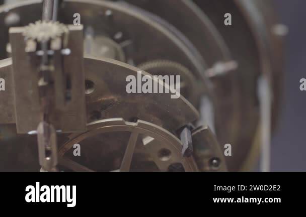 An inside view macro shot of an antique vintage clock with a detailed ...