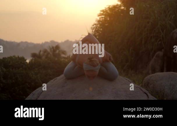 Locked lotus pose Stock Videos & Footage - HD and 4K Video Clips - Alamy