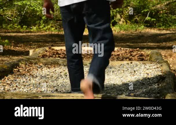 Barefoot track Stock Video Footage - Alamy
