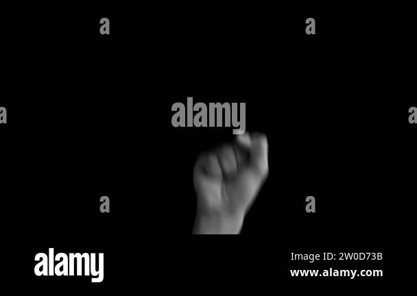 CLOSE UP SHOT OF HUMAN HAND OF CAUCASIAN WHITE ISOLATED ON BLACK COMING ...