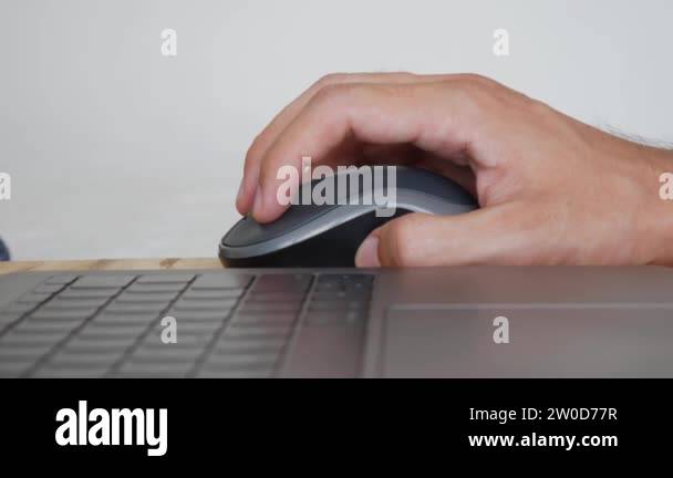 Hand using wireless mouse with laptop, personal computer use for office ...