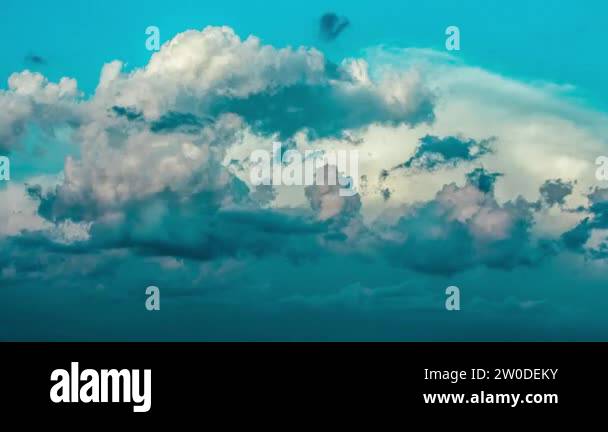 CLOUDS TIME LAPSE, BUILDING MOTION CLOUD WITH BLUE SKY. Puffy fluffy ...