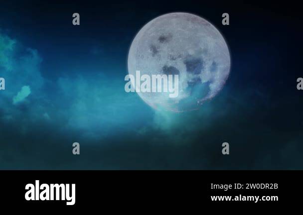Howling Full Moon with Rolling Fog 4K Loop features a full moon hanging in the sky with moving ...