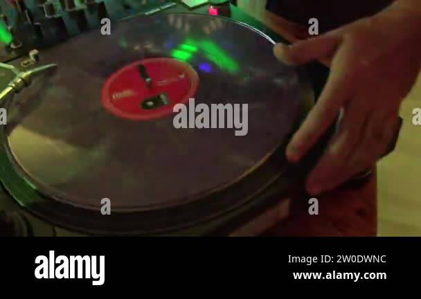 DJ console at a nightclub party. Adjustment of high and low frequencies ...