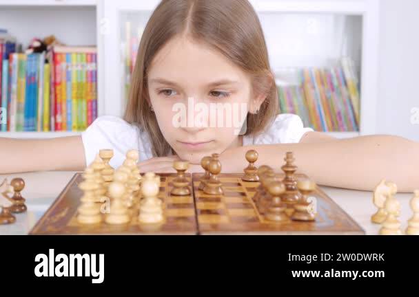 Kid playing chess Stock Videos & Footage - HD and 4K Video Clips - Alamy
