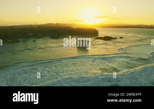 Big waves are coming and Beautiful sunset landscape at the wooden ...