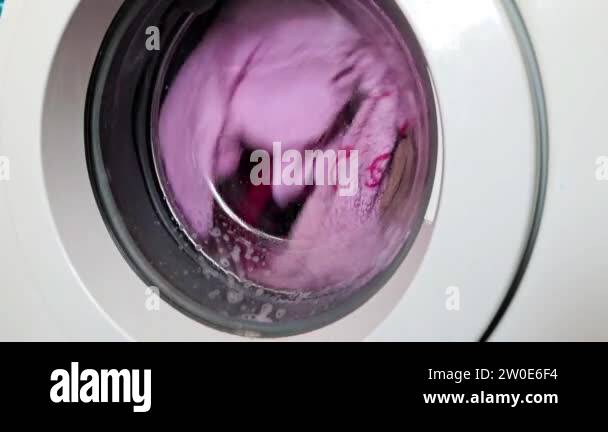 rotation of the washing machine drum while washing clothes Stock Video ...