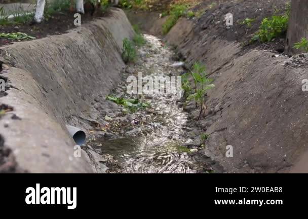 Sewage from the sewer. Waste water flow to sewer with bad water from ...