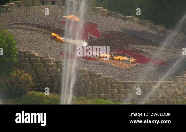 The Anheuser-Busch Emblem/Logo Seen Behind Water Spraying into the Air ...