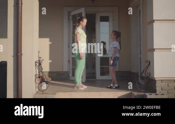 Mum child outside house Stock Videos & Footage - HD and 4K Video Clips ...