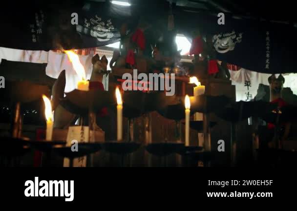 Kyoto, Japan-14 April, 2019: 4K, Candles burning in small temple at ...