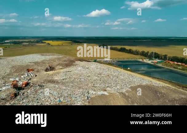 Toxic lakes at the landfill. Top view of the garbage dump. panoramic ...