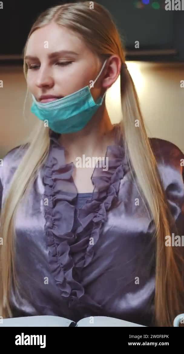 Working at home: woman making physical warm up activities sitting at ...