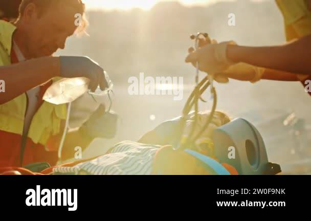 On the Car Crash Traffic Accident Scene: Paramedics Saving Life of a ...