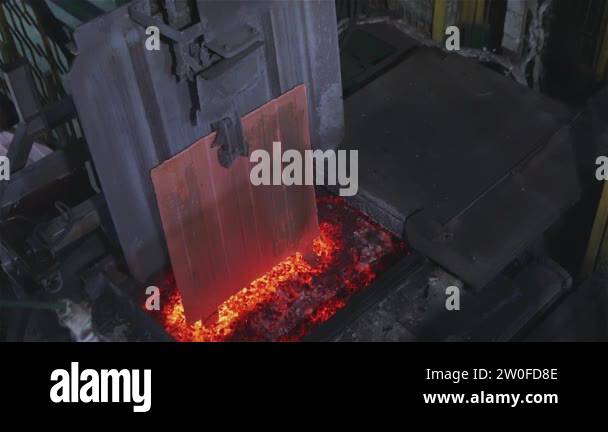 Automated copper feed line to the furnace. The melting of copper in the ...