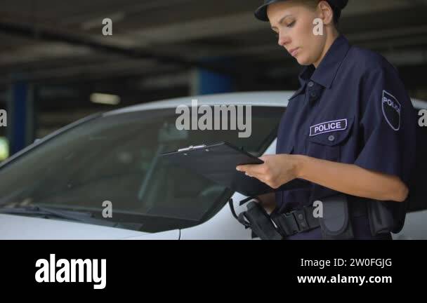 Cop writing ticket Stock Videos & Footage - HD and 4K Video Clips - Alamy