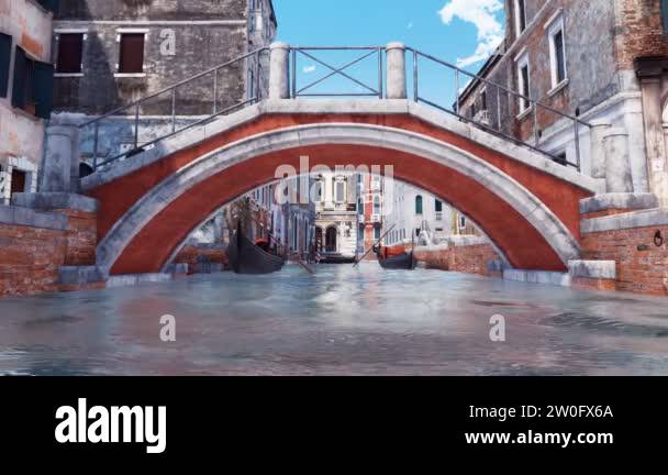 Low angle view during passing under old stone bridge over narrow water ...