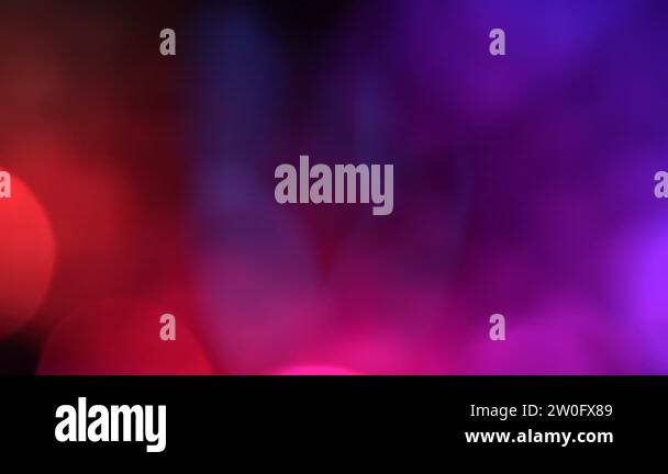 Colorful light pulses and glows color changing RGB on dark background ...